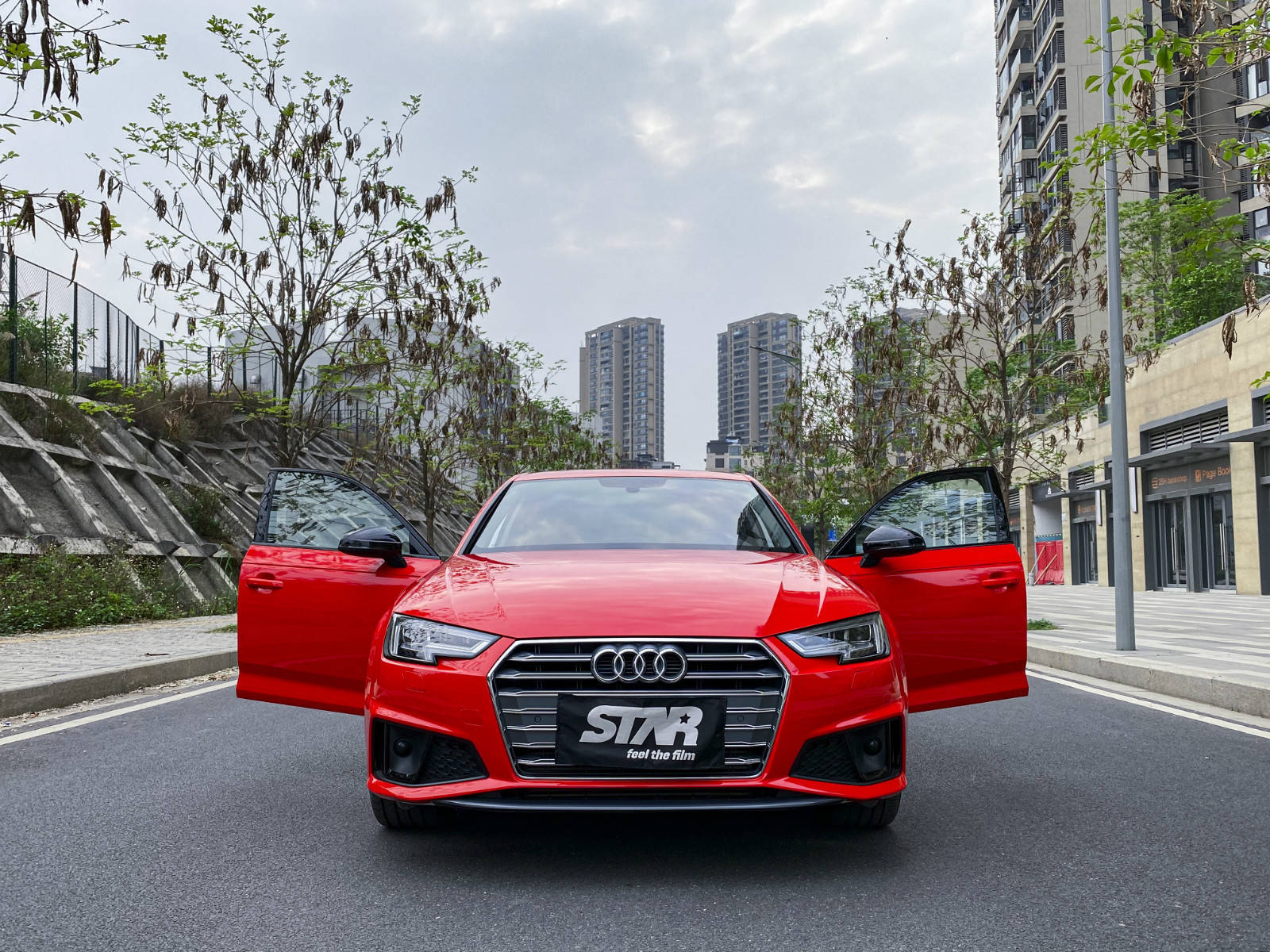 江苏汽车车身改色|STAR星魔改色膜奥迪A4L PET法拉利红案例展示_搜狐汽车_搜狐网